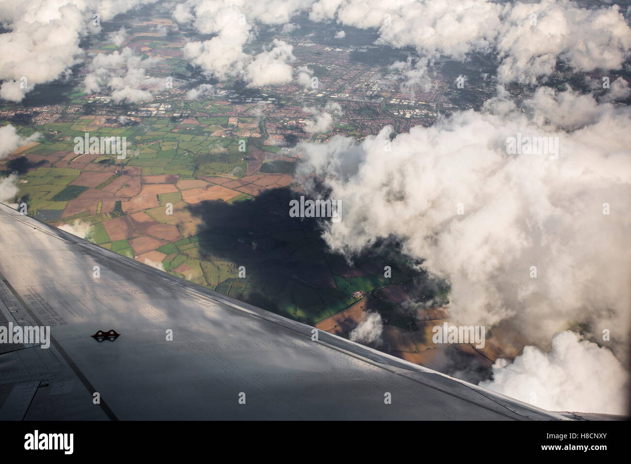 View from an aircraft window to the ground and sky scene outside Stock ...
