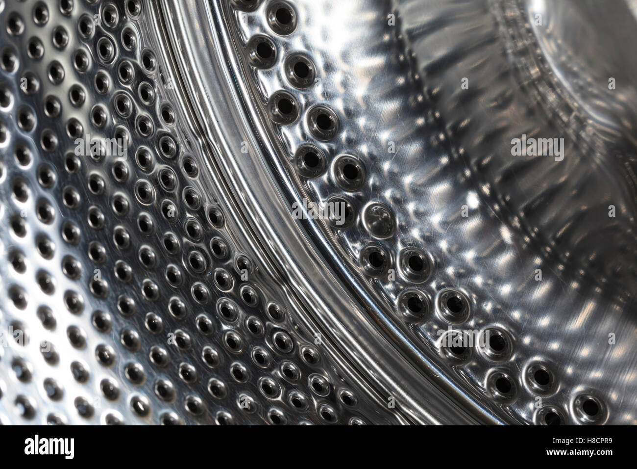 Inside a washing machine drum Stock Photo - Alamy