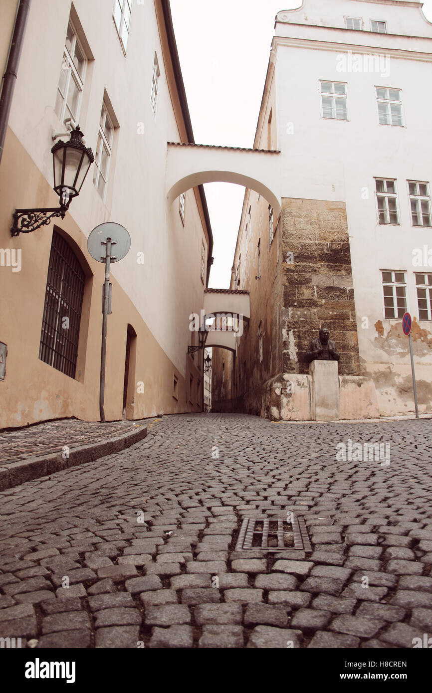 Narrow pedestrian alley between tenement houses in Prague. Stare Mesto ...