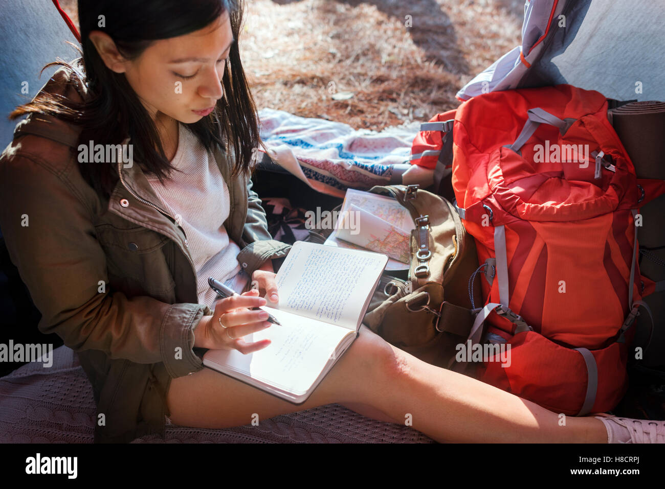 Woman Reading Traveling Destination Camping Concept Stock Photo - Alamy