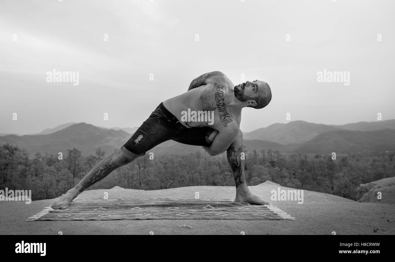 Man doing yoga meditation Black and White Stock Photos & Images - Alamy