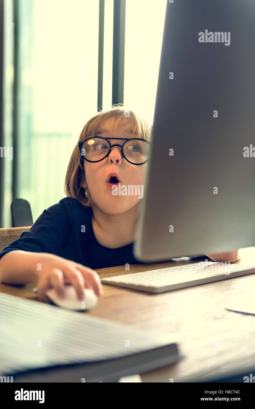 Little Girl Using Device Concept Stock Photo - Alamy