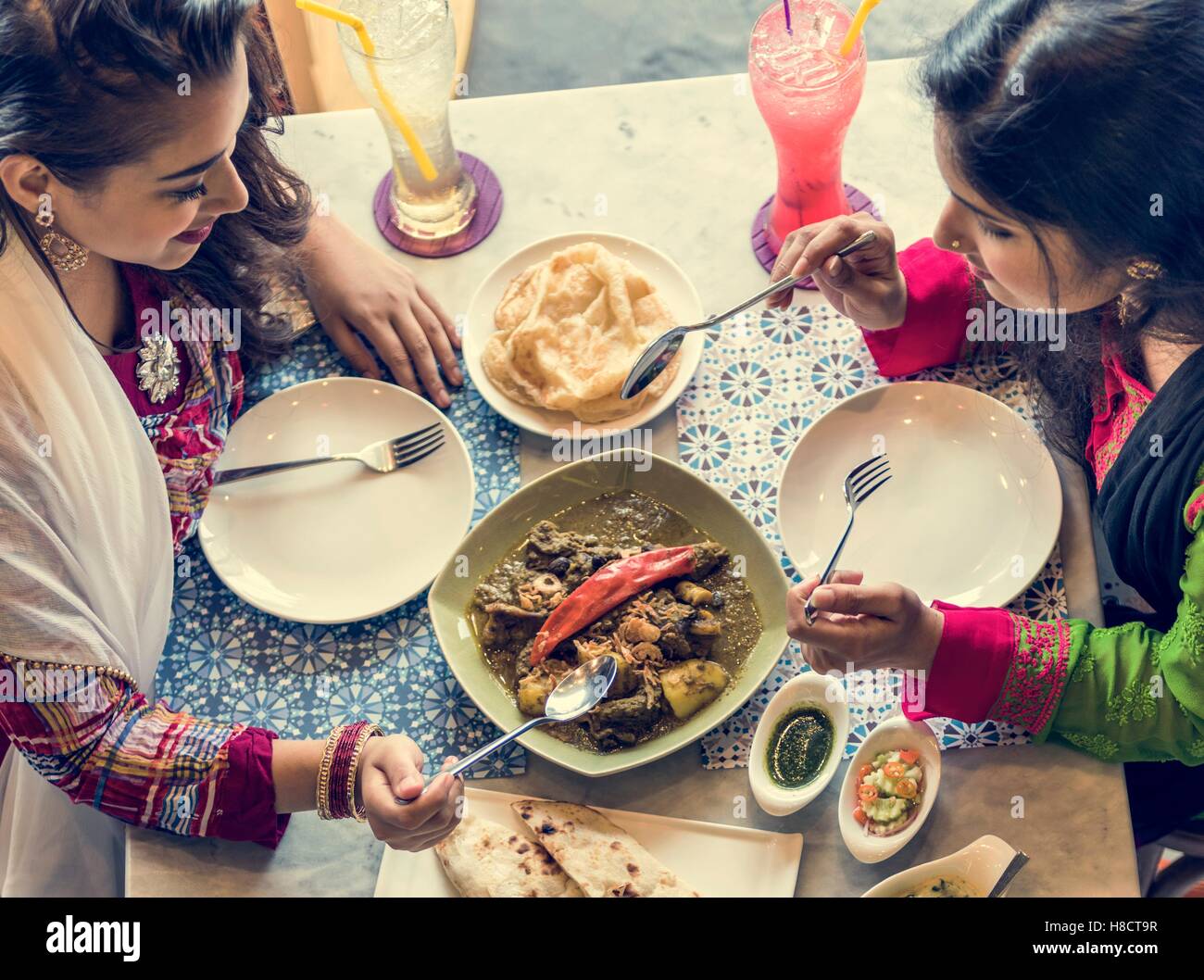 Indian Community Eating Restaurant Dining Concept Stock Photo - Alamy