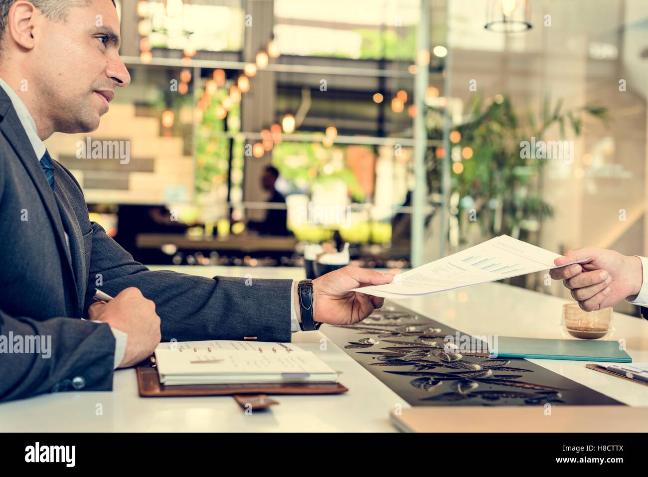 Business Man Handing Out Report Restaurant Table Concept Stock Photo ...