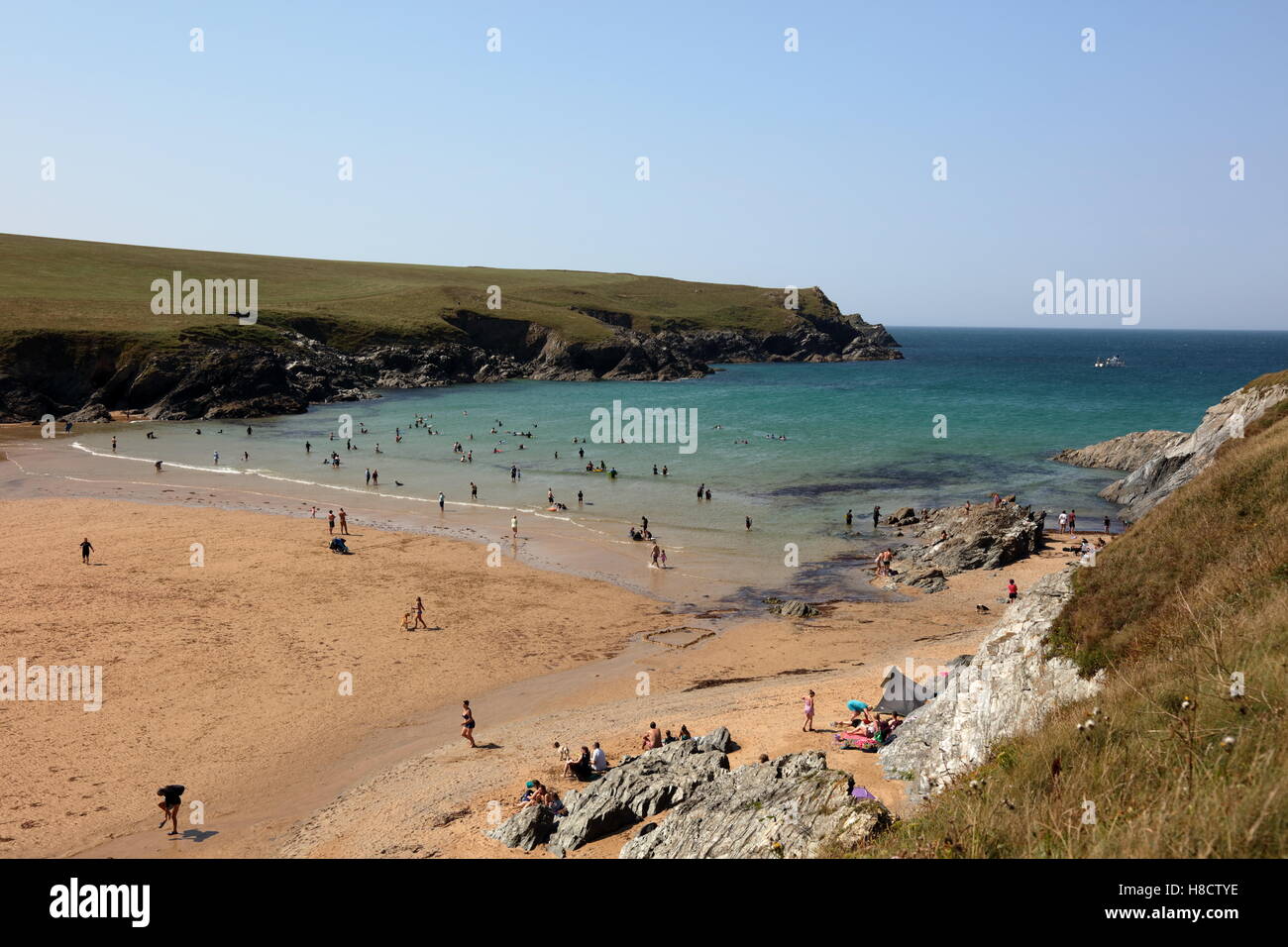 Porth Joke (Polly Joke) beach, North Cornwall coast UK with bathers ...