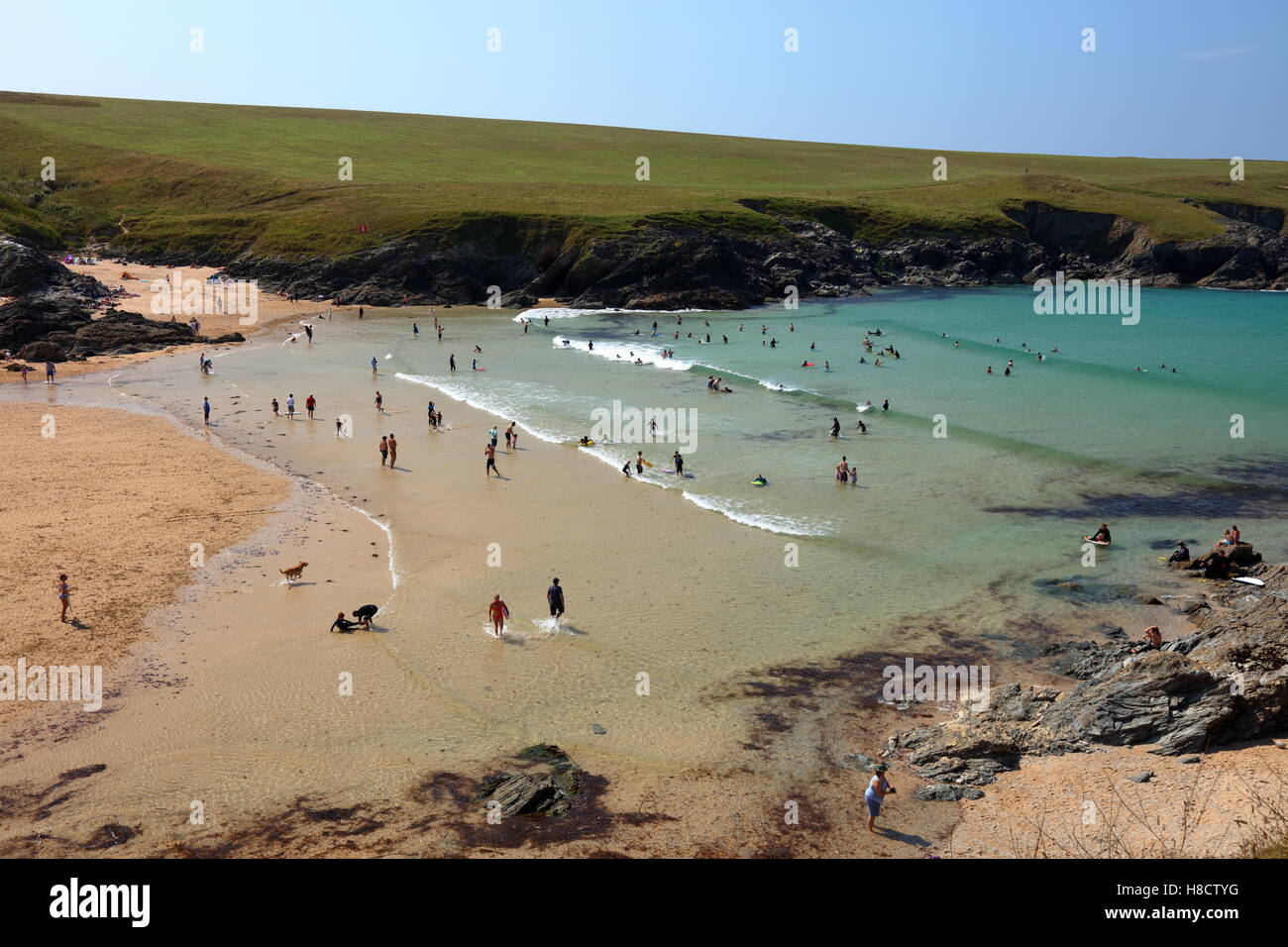 Porth Joke (Polly Joke) beach, North Cornwall coast UK with bathers ...