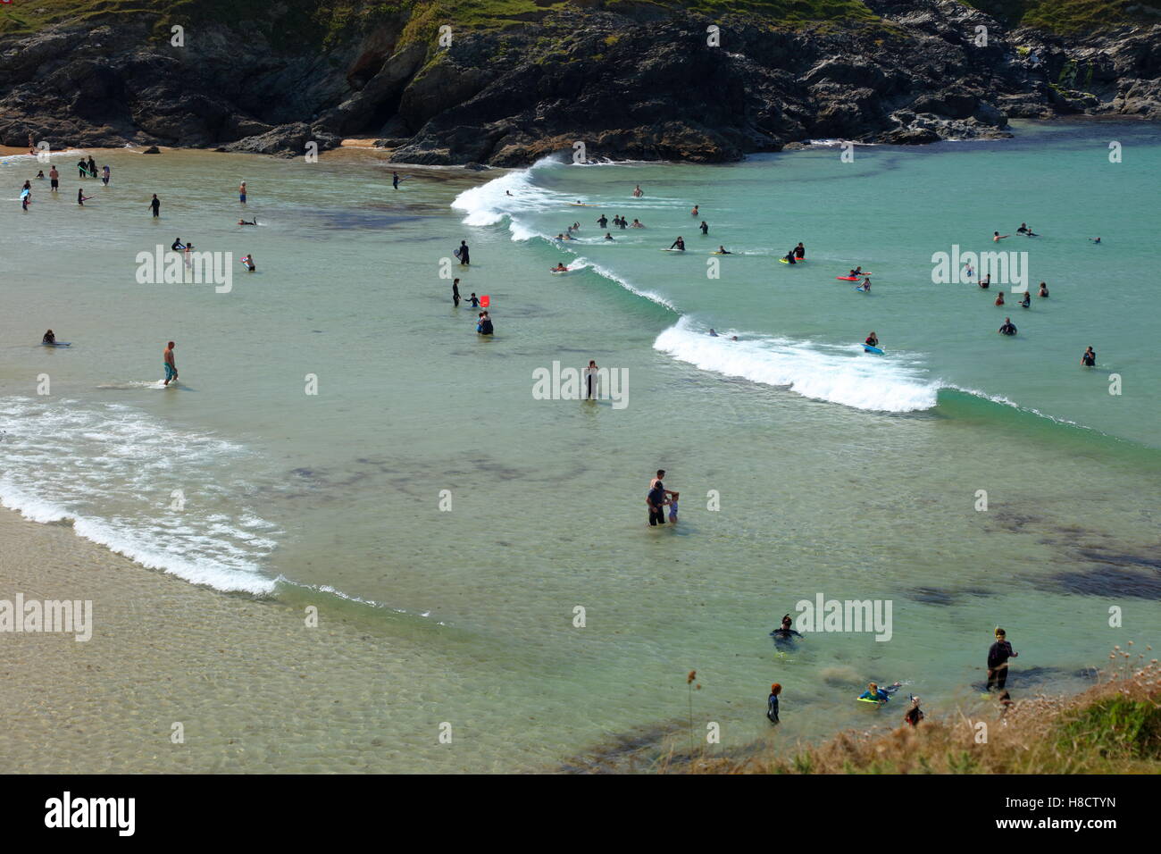 Porth Joke (Polly Joke) beach, North Cornwall coast UK with bathers ...