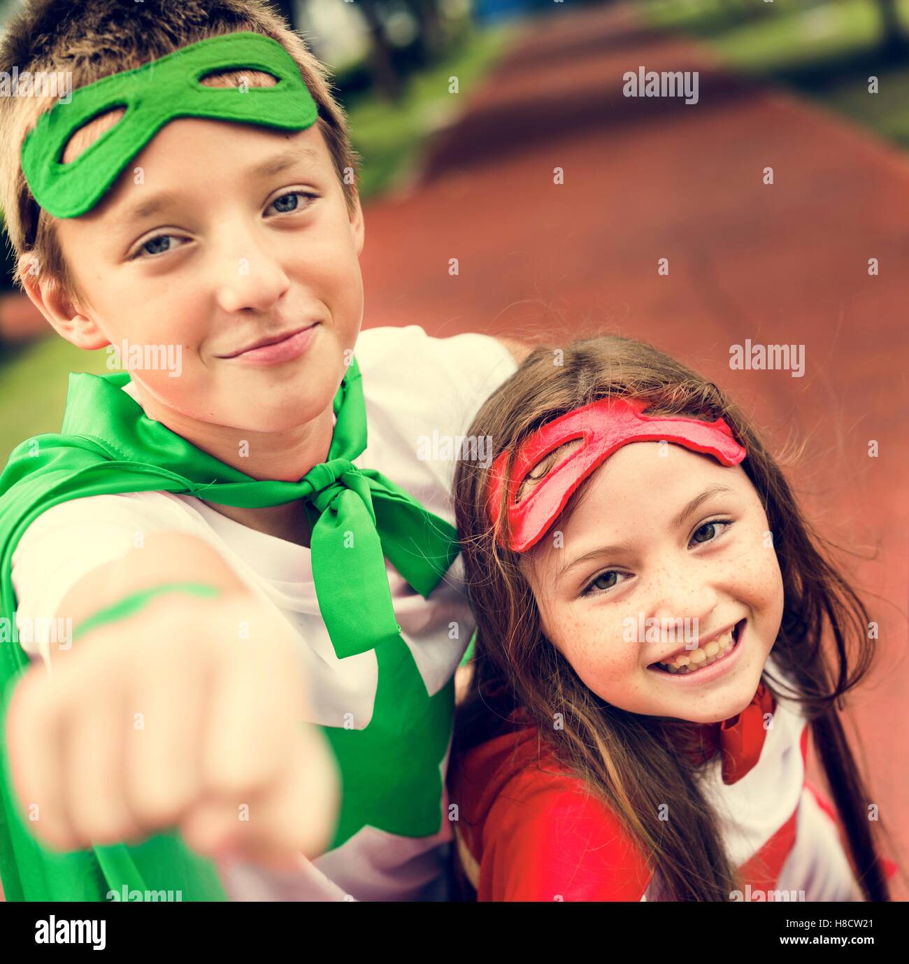 Superhero Boy Girl Brave Imagination Costume Concept Stock Photo - Alamy