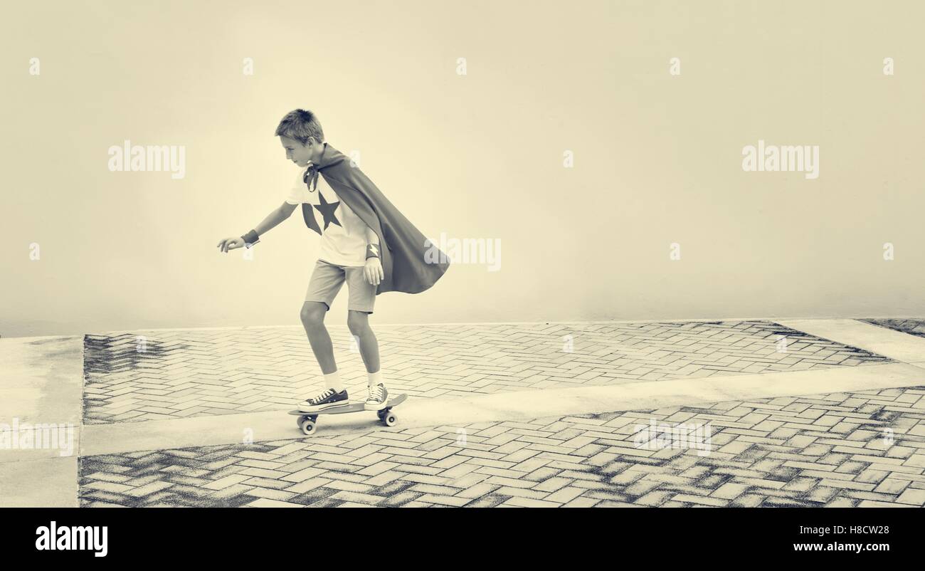 Superhero Boy Imagination Freedom Skateboard Concept Stock Photo - Alamy