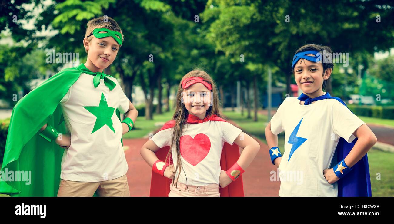 Superhero Boy Girl Brave Imagination Concept Stock Photo - Alamy