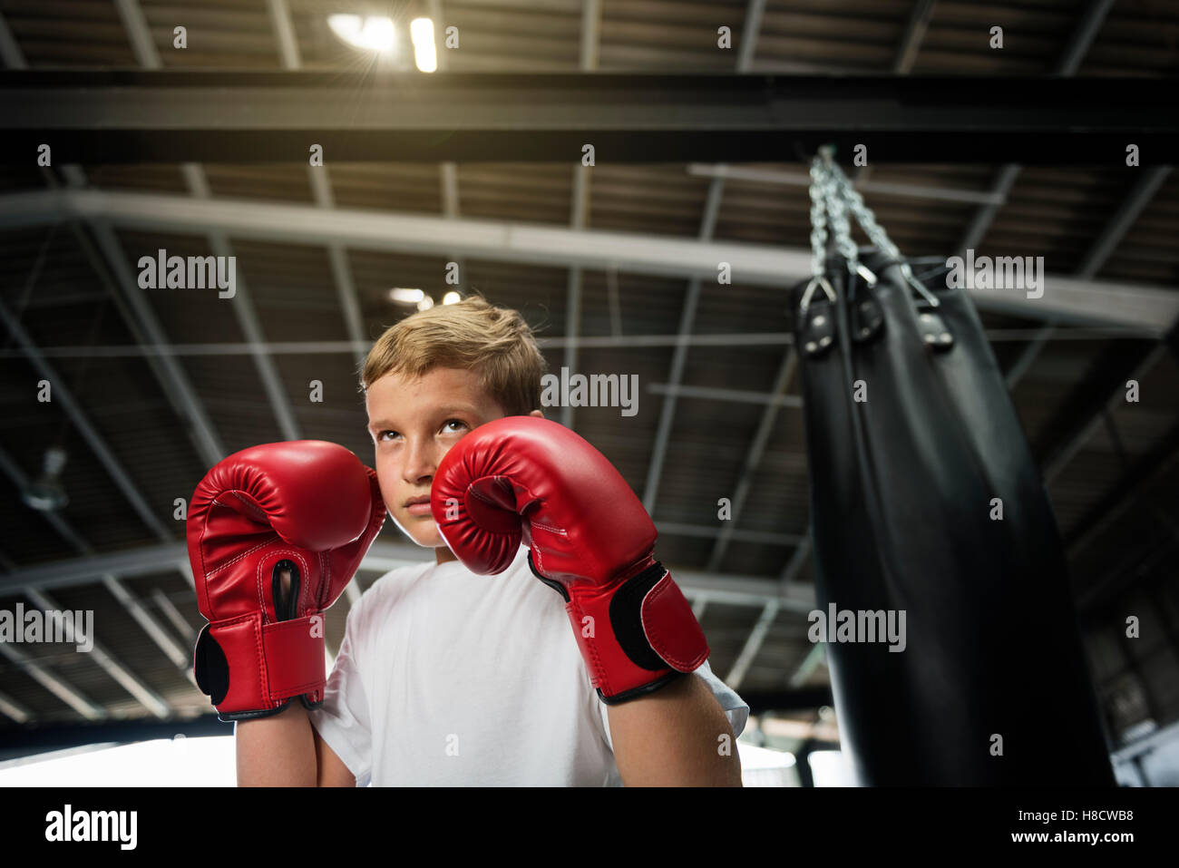 Boy Boxing Training Punching Bag Exercise Concept Stock Photo - Alamy