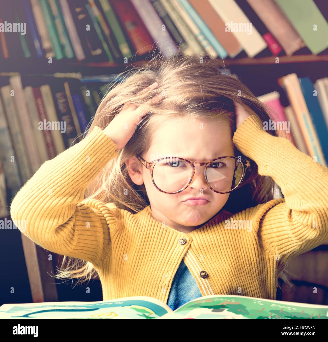 Adorable Cute Girl Stressed Out Reading Concept Stock Photo - Alamy