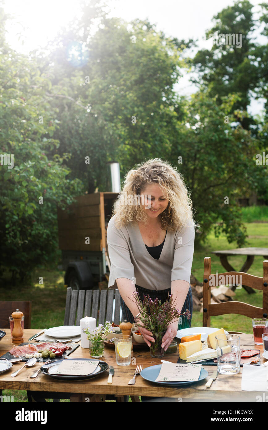 Woman Preparing Table Dinner Concept Stock Photo - Alamy