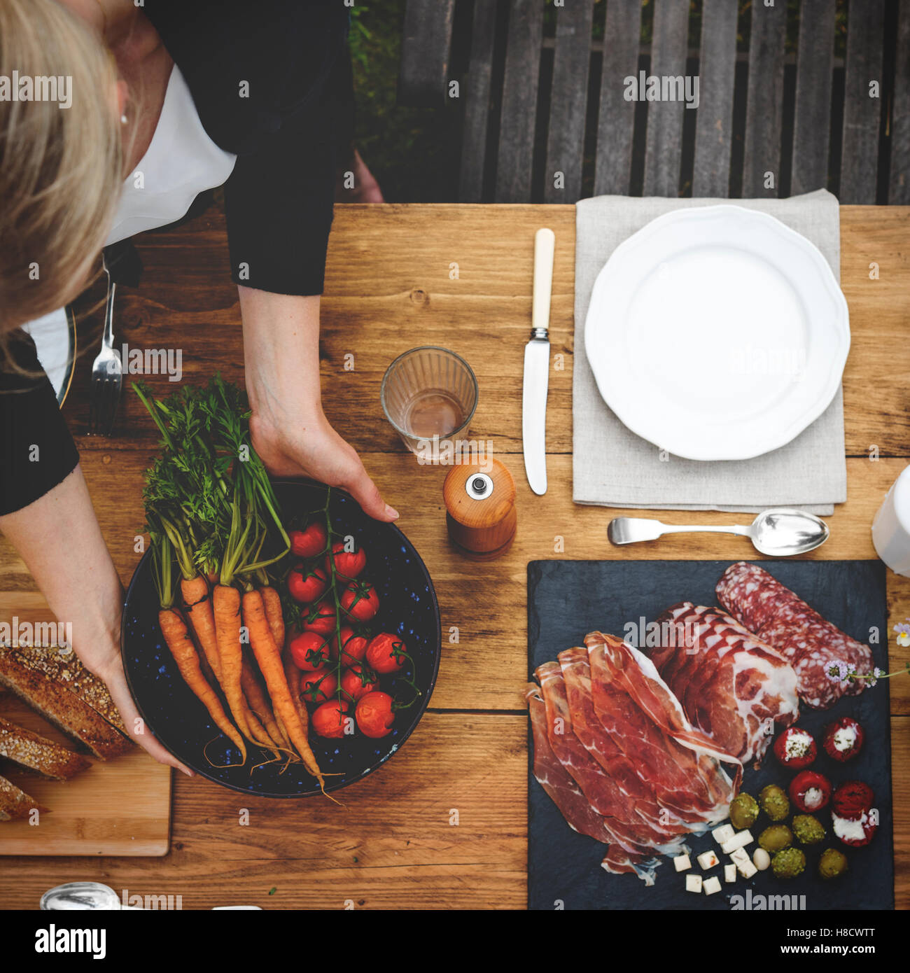 Woman Preparing Table Dinner Concept Stock Photo - Alamy