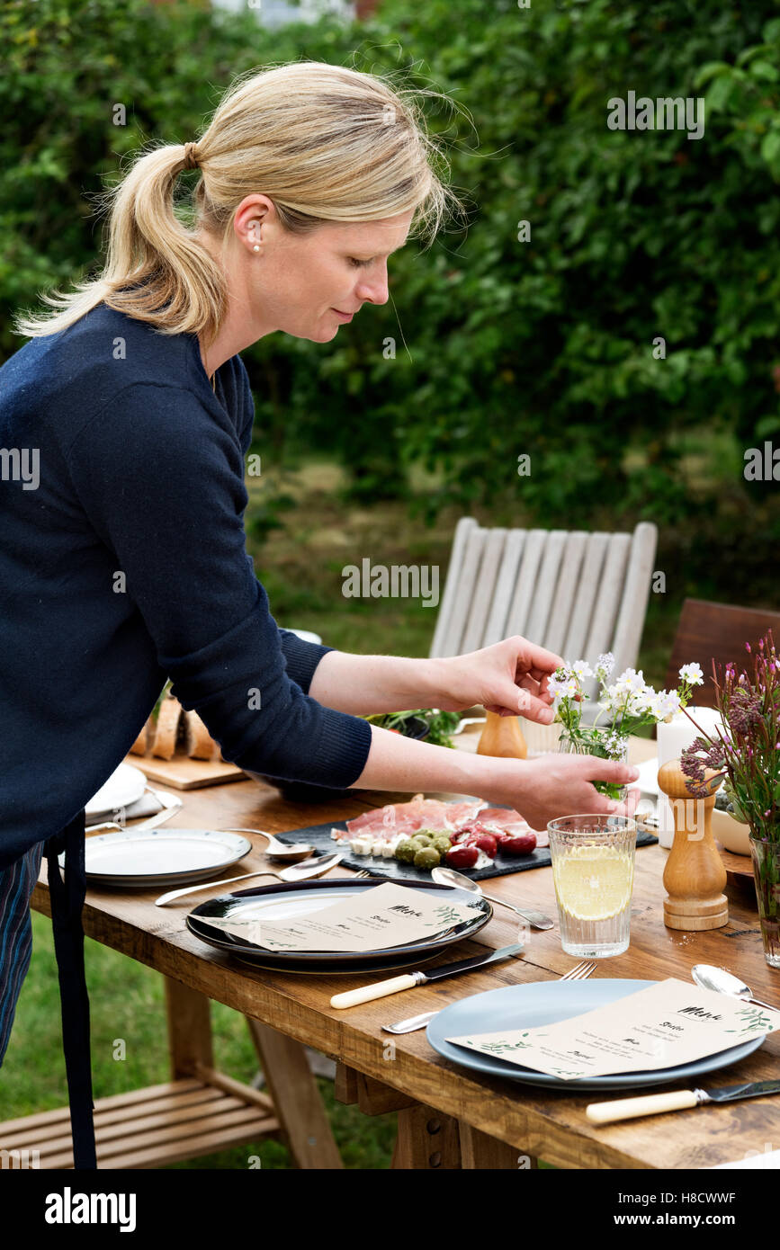 Woman Preparing Table Dinner Concept Stock Photo - Alamy