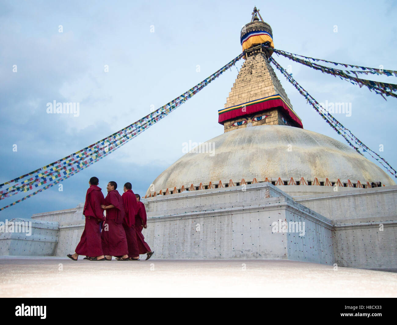 Walking buddhist monks at Boudhanath, stupa in Kathmandu, Nepal Stock ...