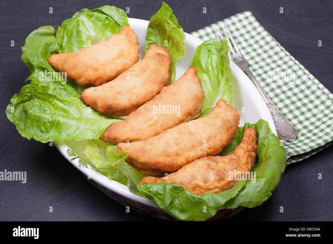 Panzerotti With Cheese And Salami Stock Photo - Alamy