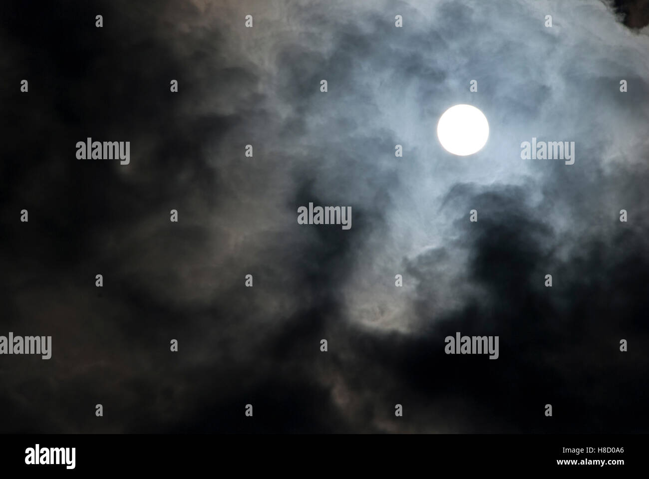 Clouds obscure sun over hi-res stock photography and images - Alamy