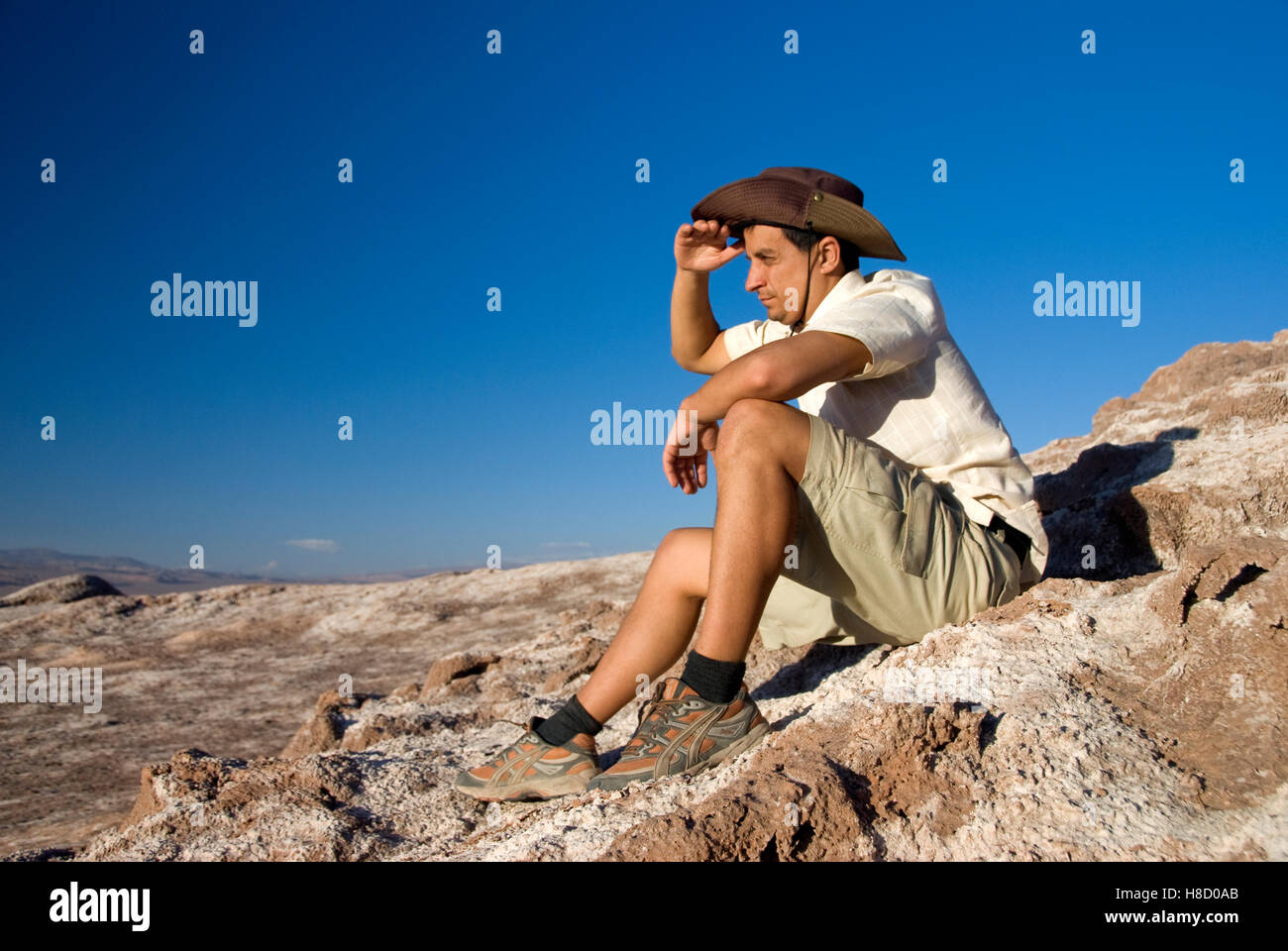 Young man, 25 +, looking out in the Atacama Desert, Chile, South ...