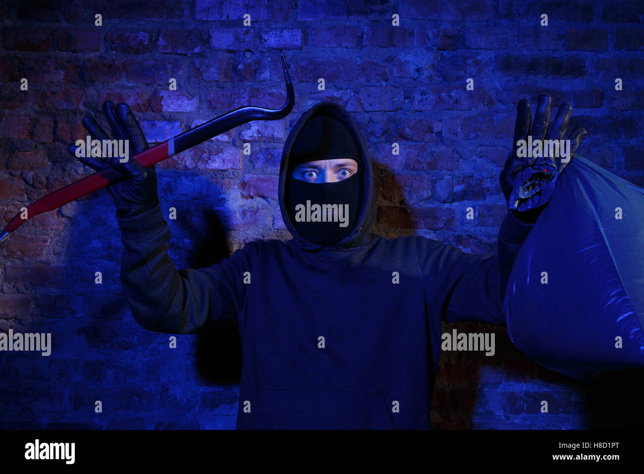 Thief with master key , bag Stock Photo - Alamy