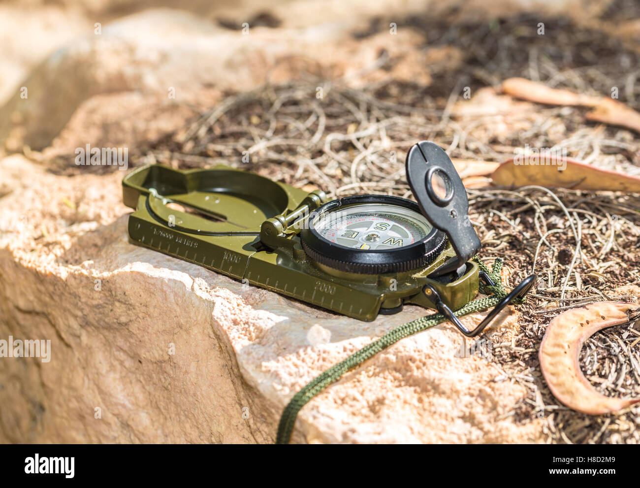 Compass on rock hi-res stock photography and images - Alamy
