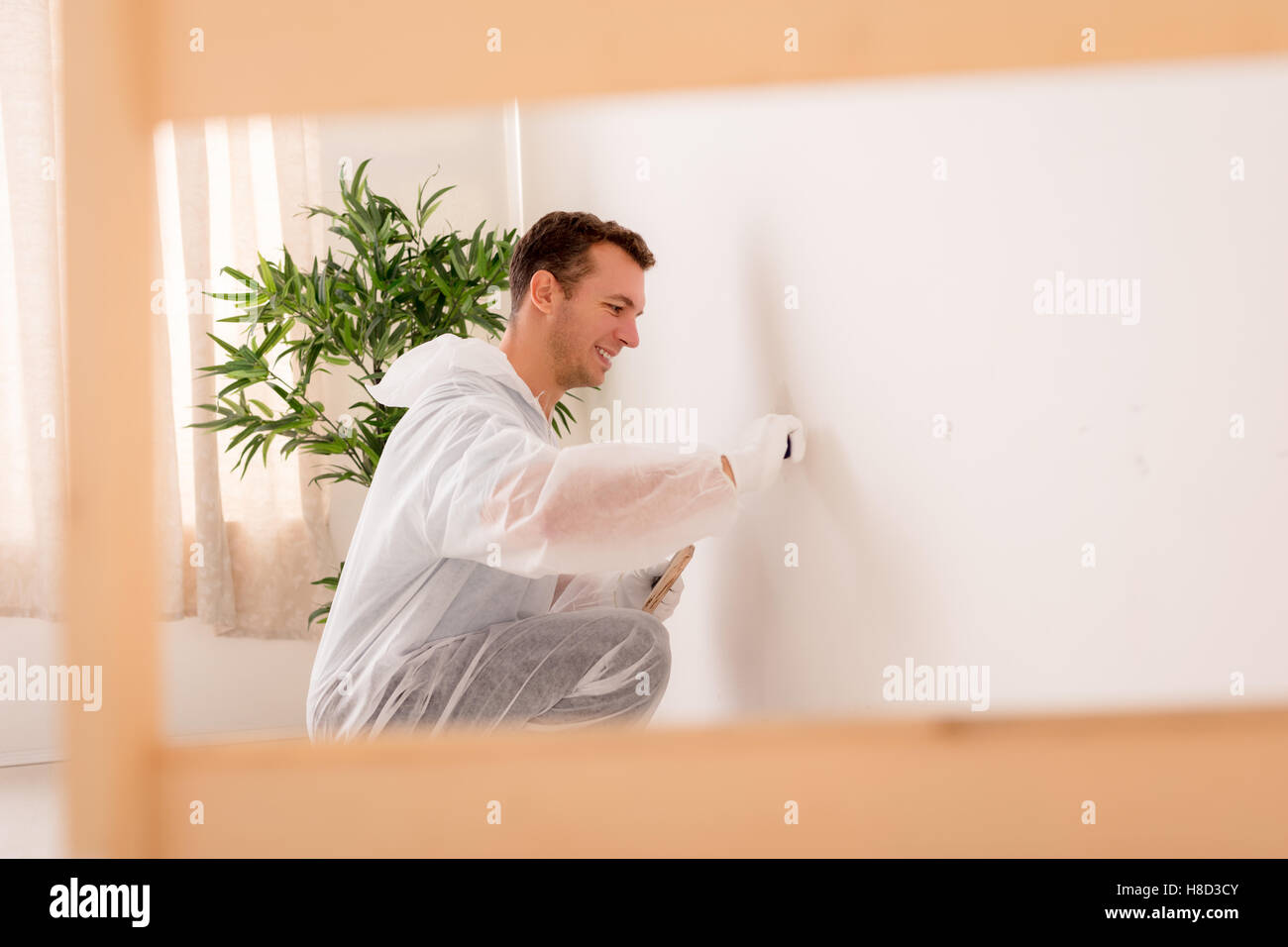 Wall smoothing hi-res stock photography and images - Alamy