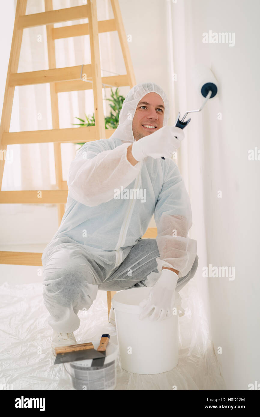Man whitewashing house hi-res stock photography and images - Alamy