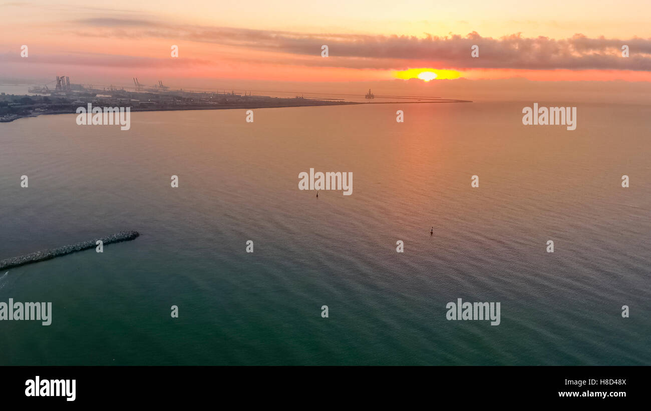 radiant sea beach sunrise Stock Photo - Alamy