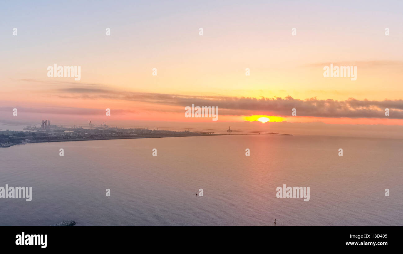 radiant sea beach sunrise Stock Photo - Alamy