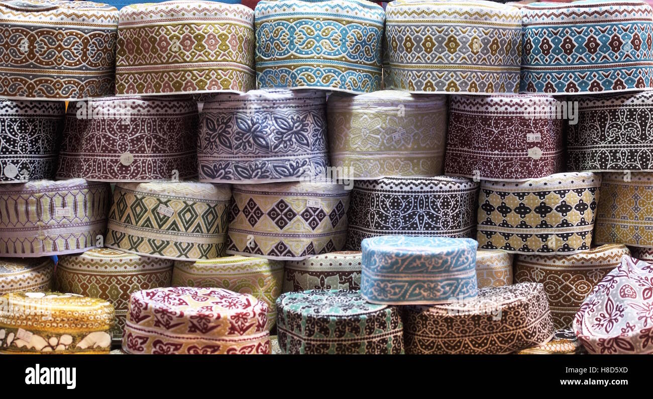 Omani hats available in a souk located in Muscat, Oman Stock Photo - Alamy