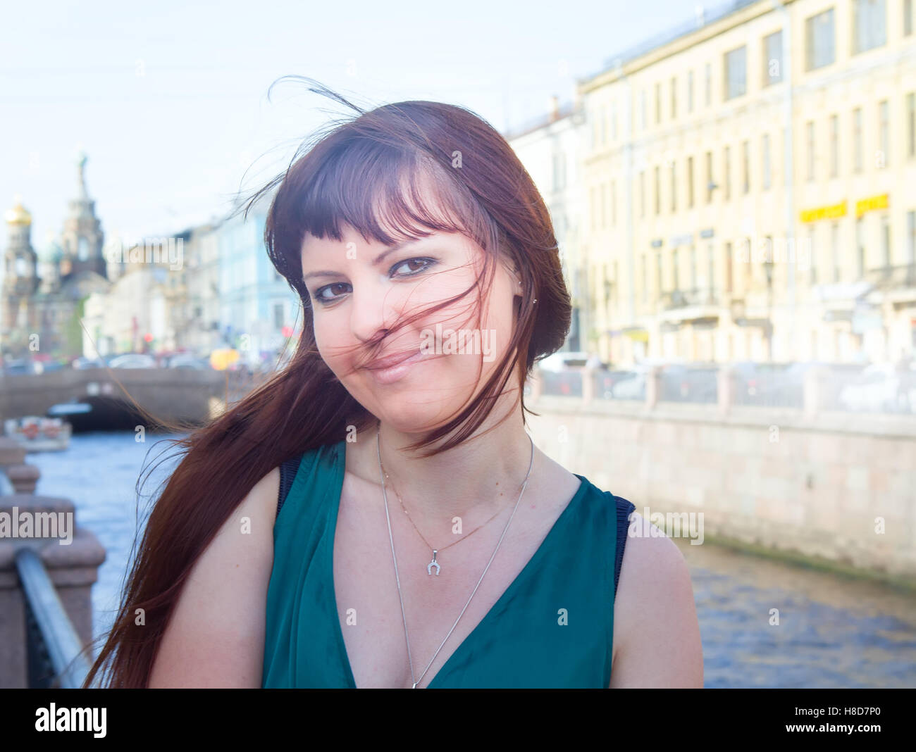 Northern Venice. Portrait of girl granite embankment and lattice ...