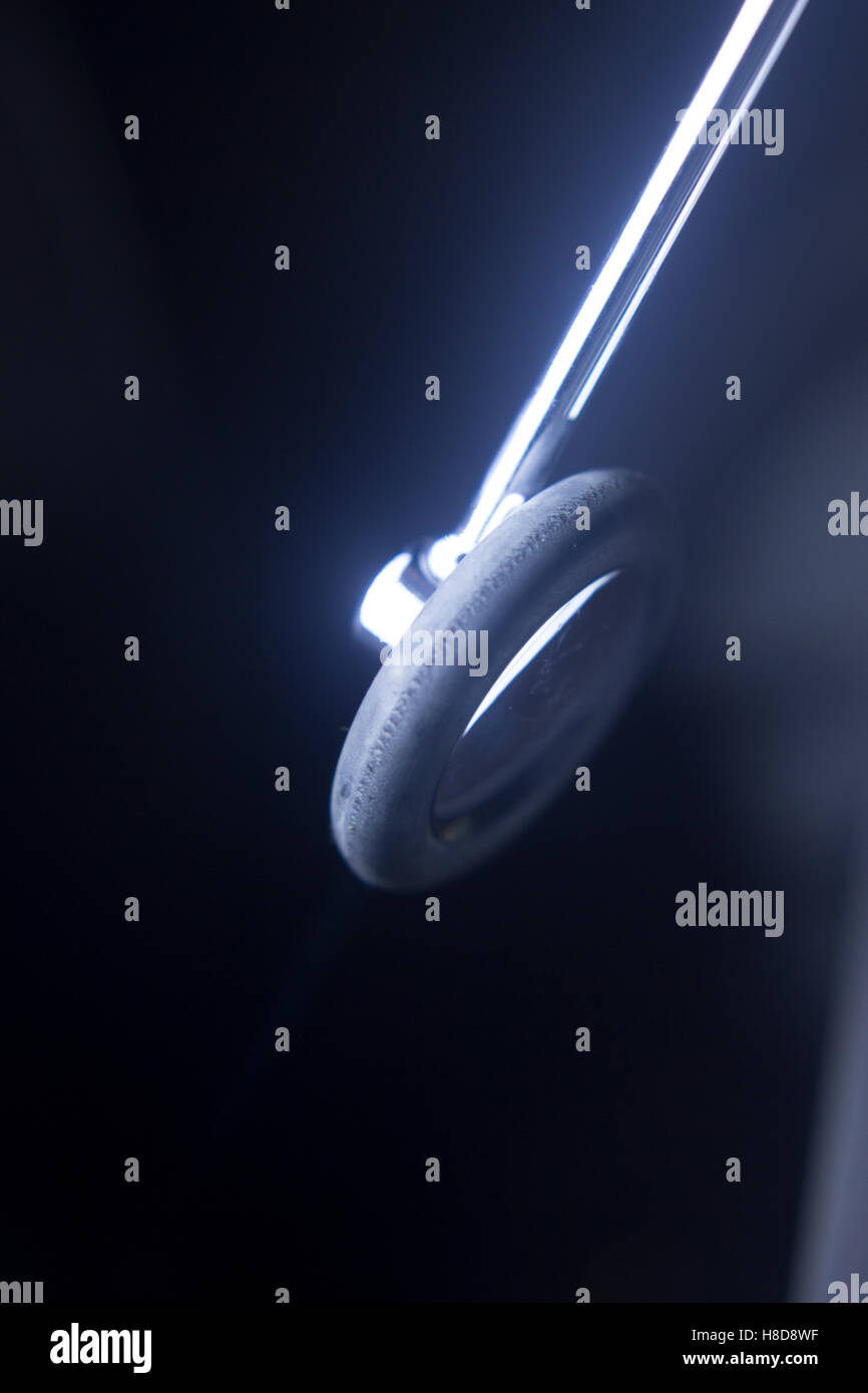 Doctor's reflex hammer tool used to test patient reflexes in knee and ...