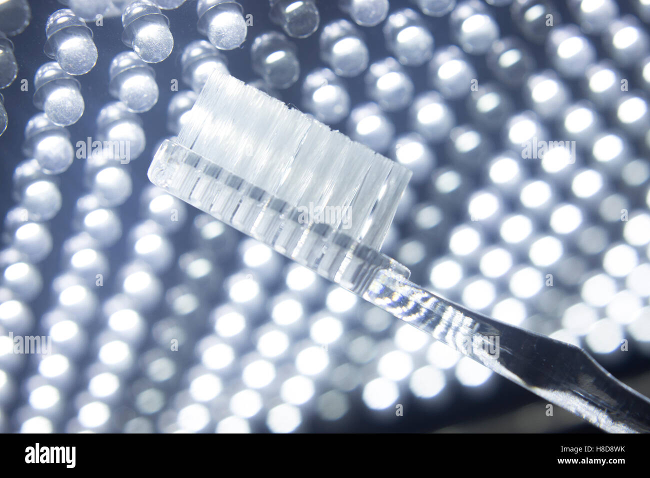Tooth brush isolated in creative artistic photo Stock Photo - Alamy
