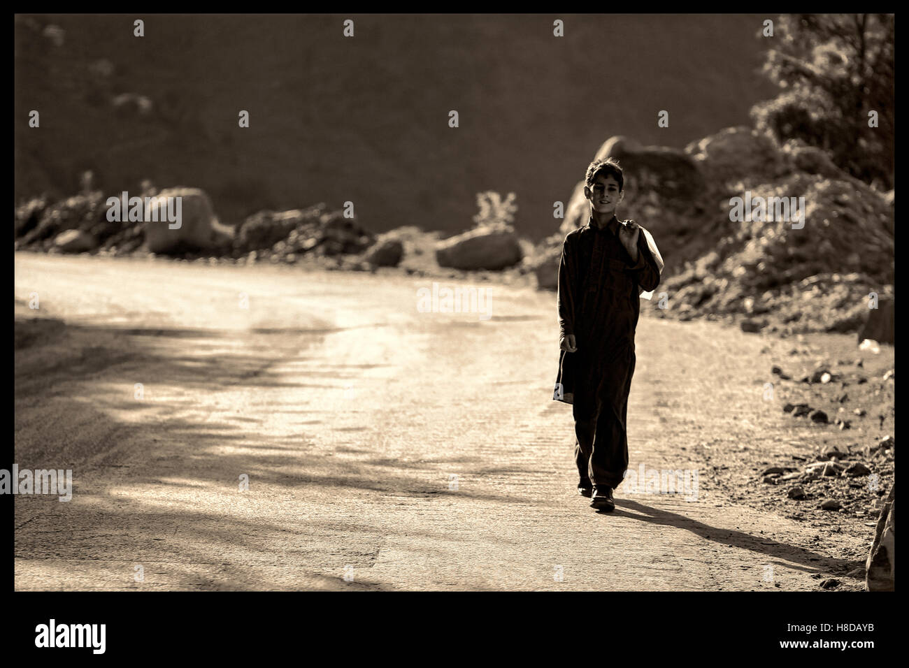 Poor boy going to school hi-res stock photography and images - Alamy