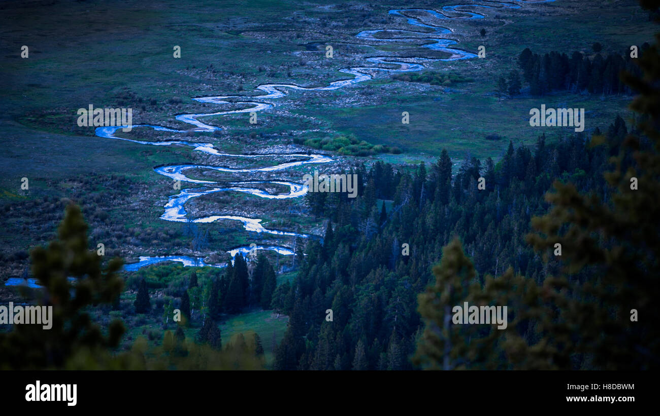 Twisty River Running through meadow Stock Photo - Alamy