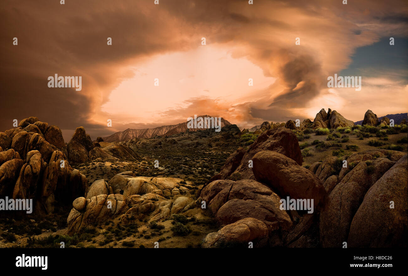 Dramatic clouds above rocky landscape Stock Photo - Alamy