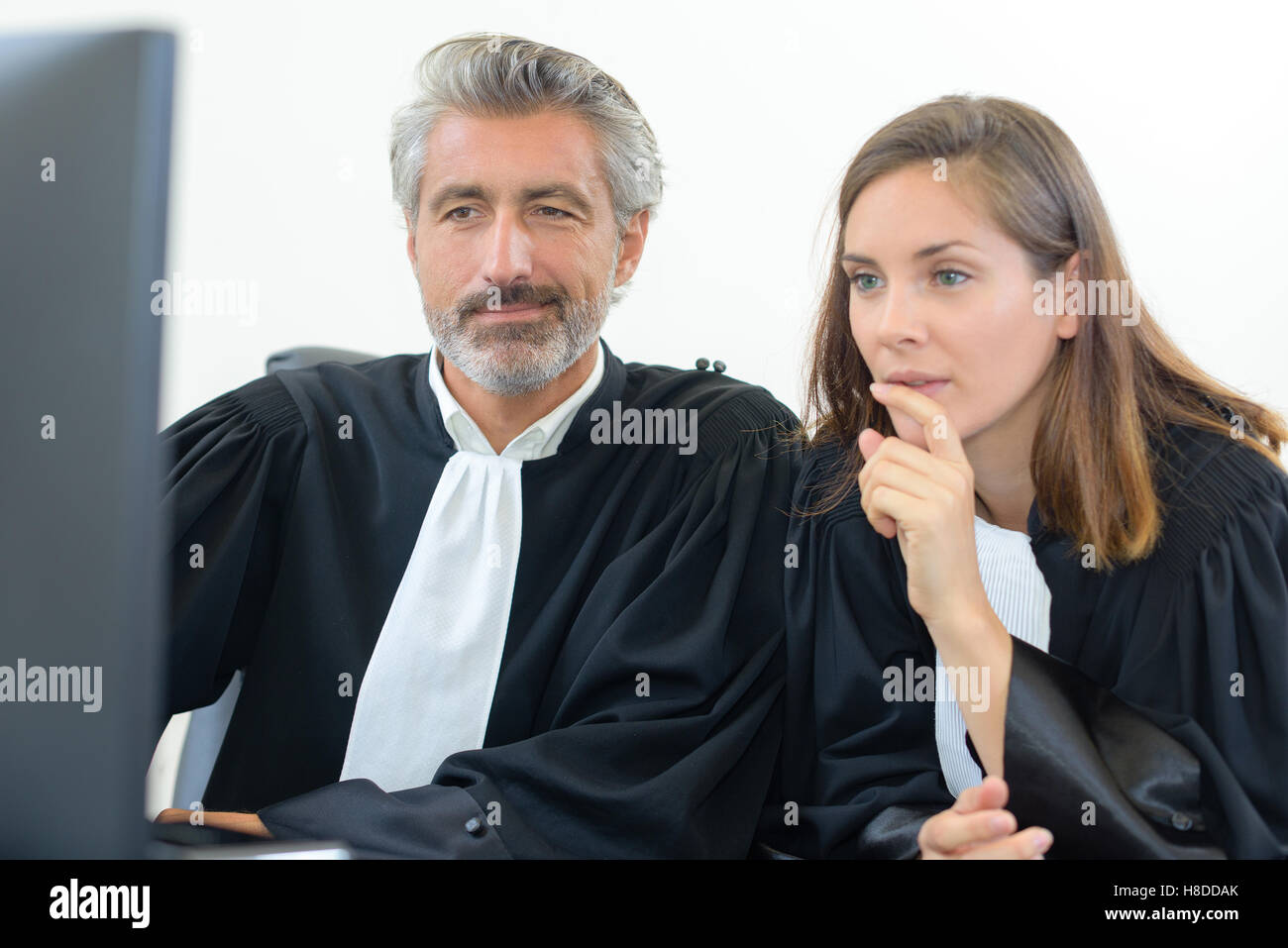 judges at a computer Stock Photo - Alamy