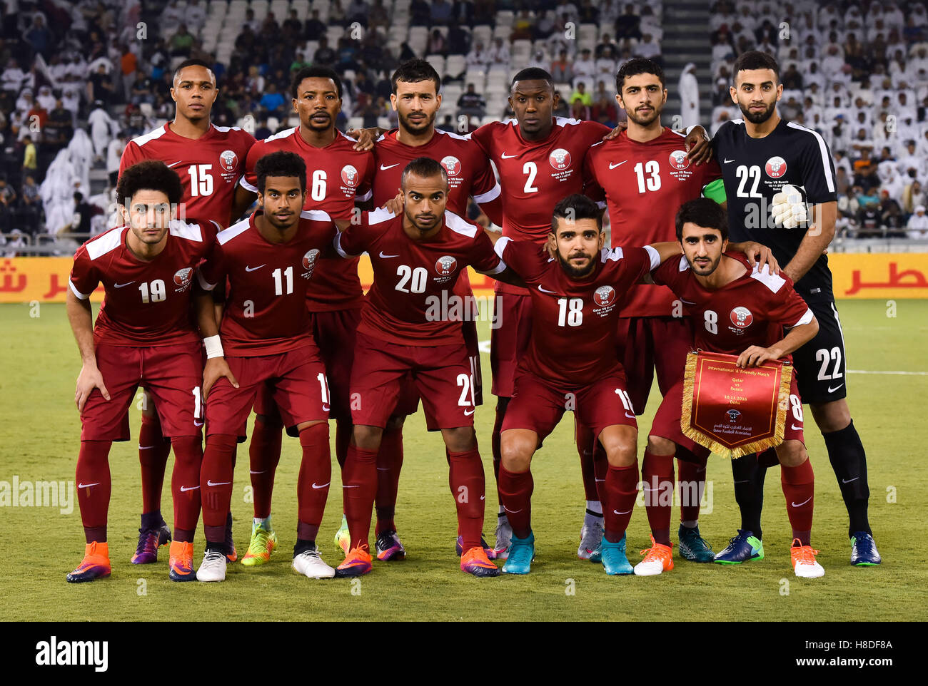 Doha, Qatar. 10th Nov, 2016. Starting players of Qatar pose for a group ...