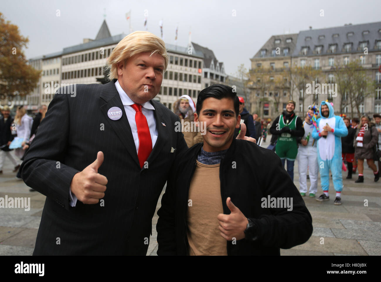 Cologne, Germany. 11th Nov, 2016. A carnivalist dressed as Donald Trump ...