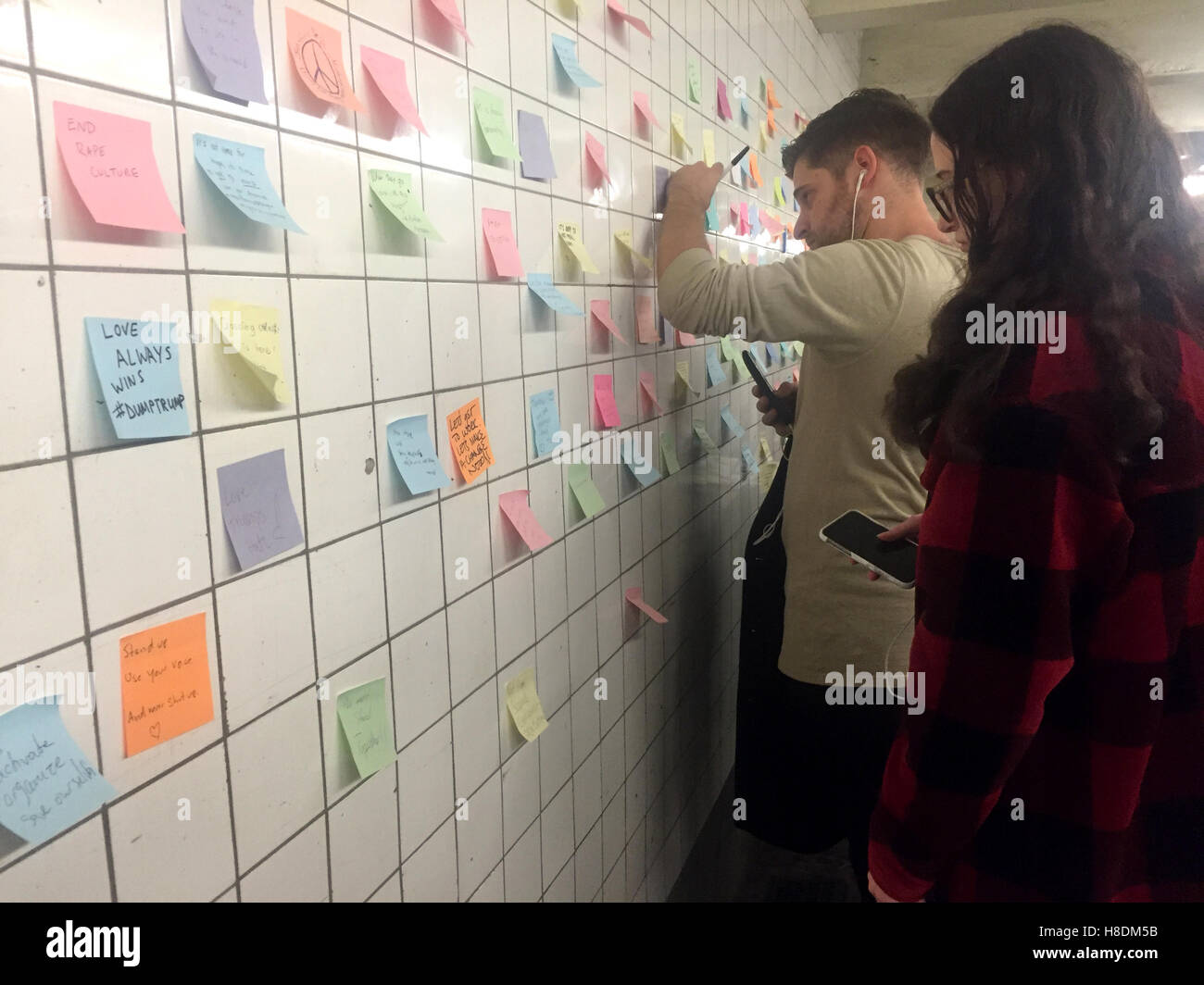 New York, US. 10th Nov, 2016. Sticky notes hanging in the subway ...