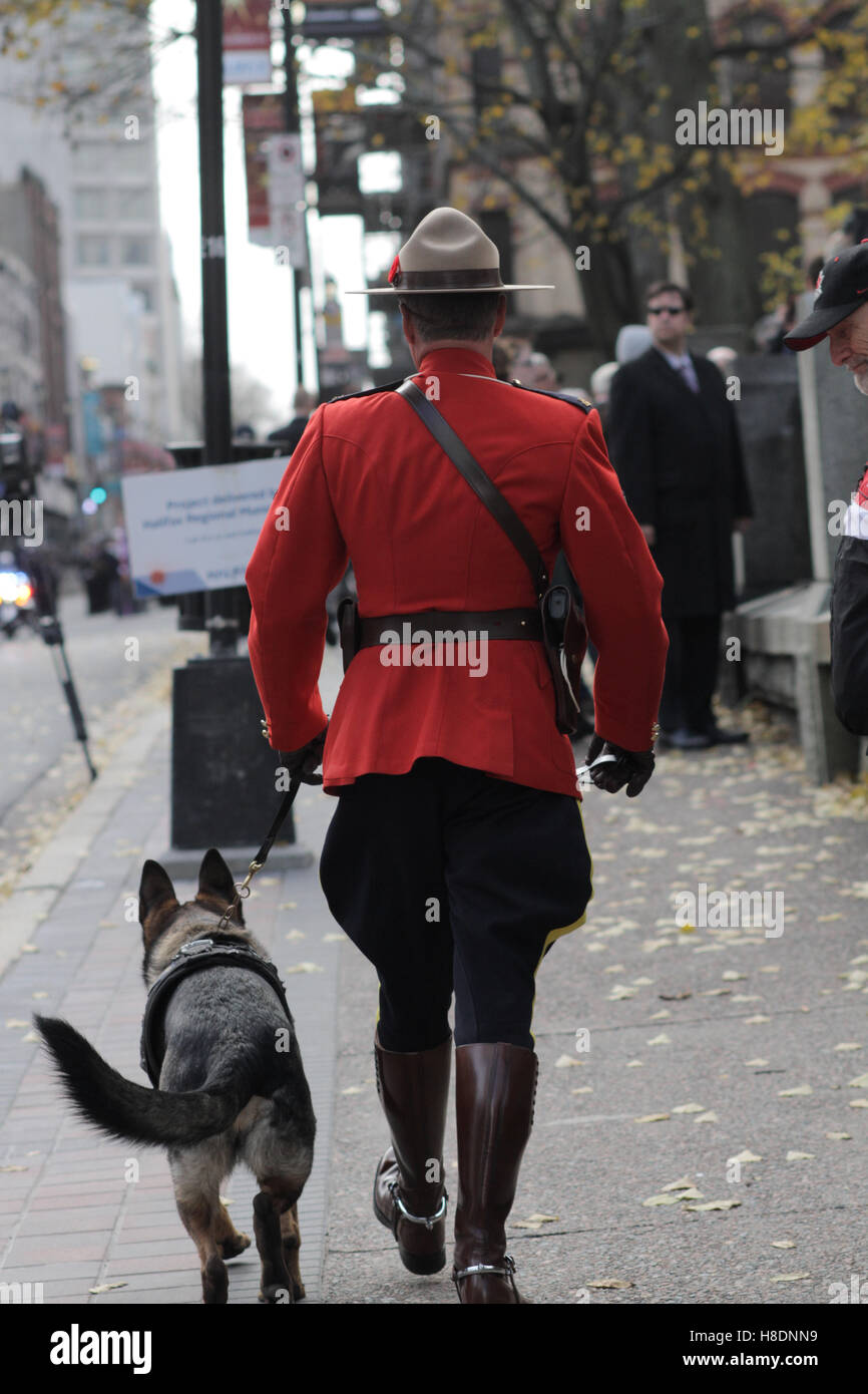 Halifax, Canada. 11th Nov, 2016. An RCMP officer with his police dog ...