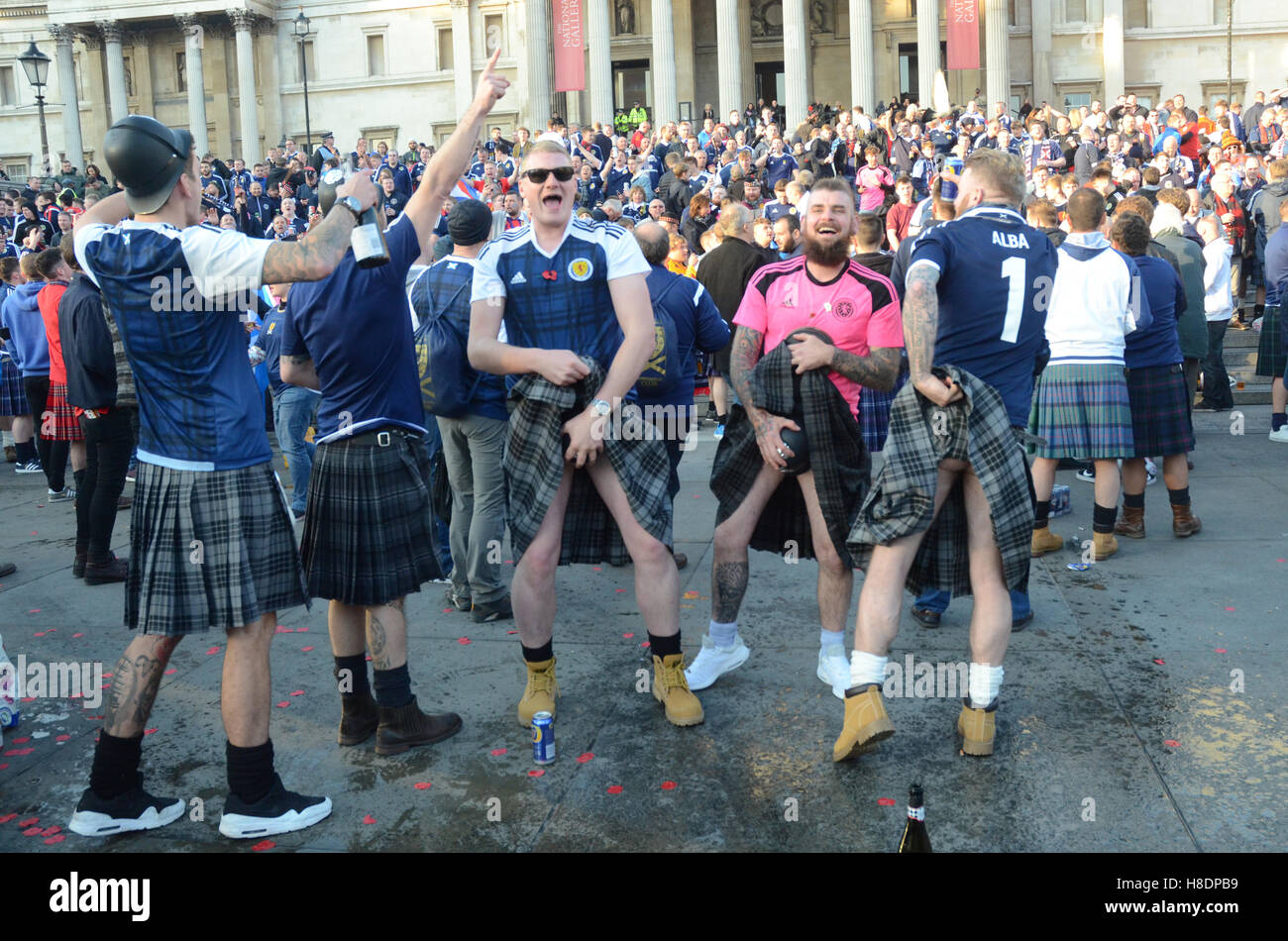 London, UK. 11th Nov, 2016. Scottish football fans gather in Trafalgar ...