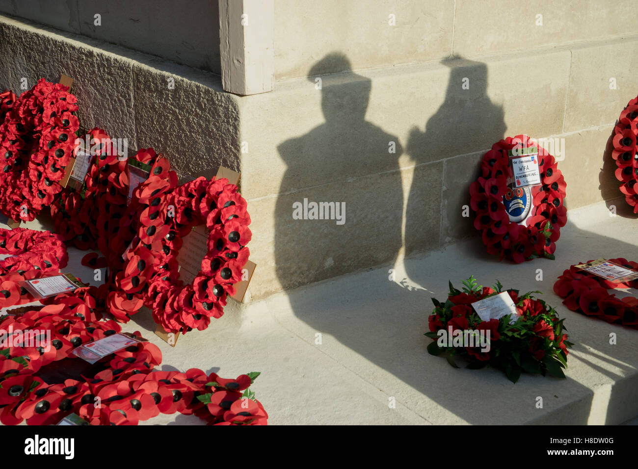 People pay respect to their dead relatives and friends with crosses and ...