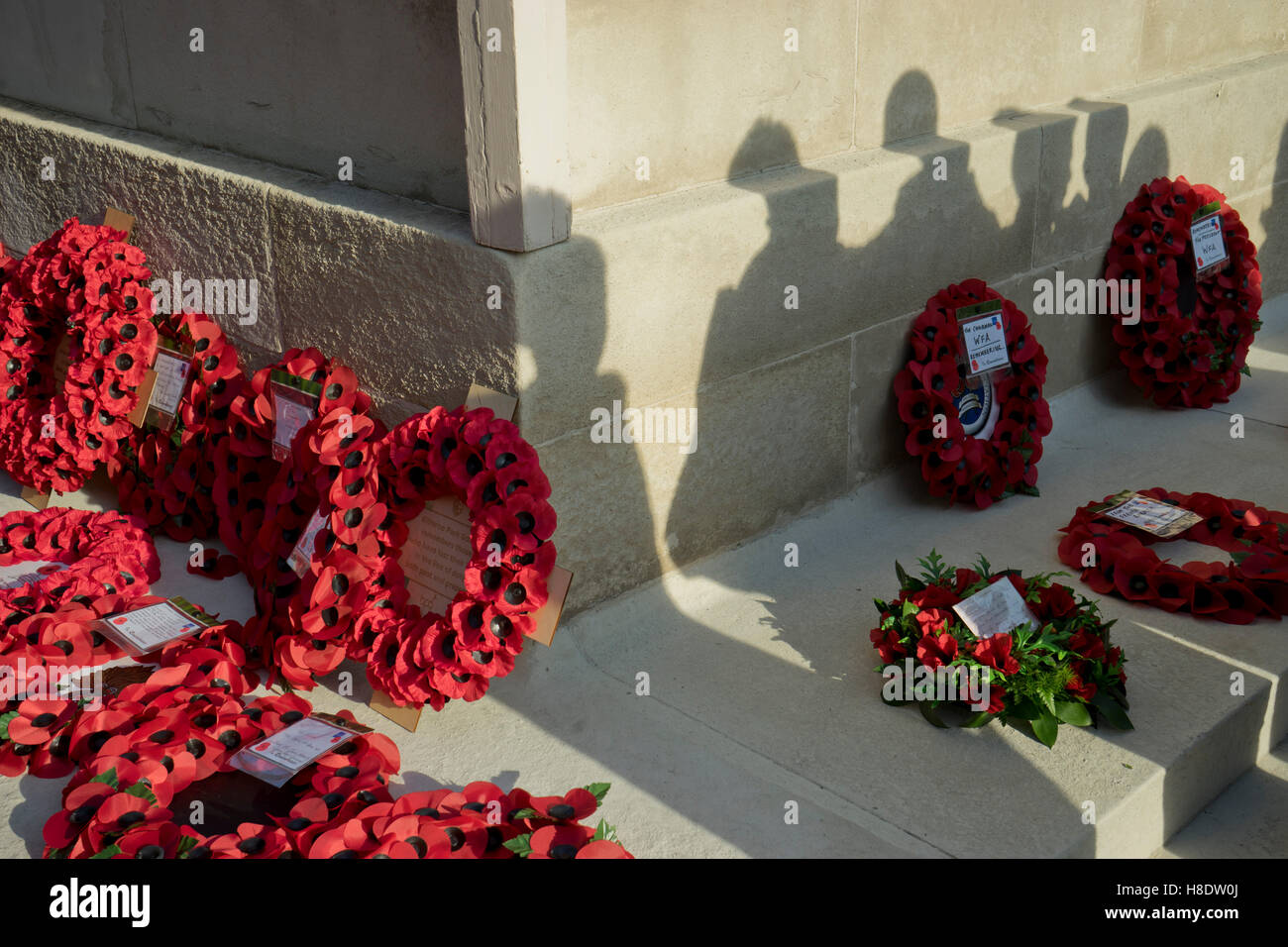 People pay respect to their dead relatives and friends with crosses and ...