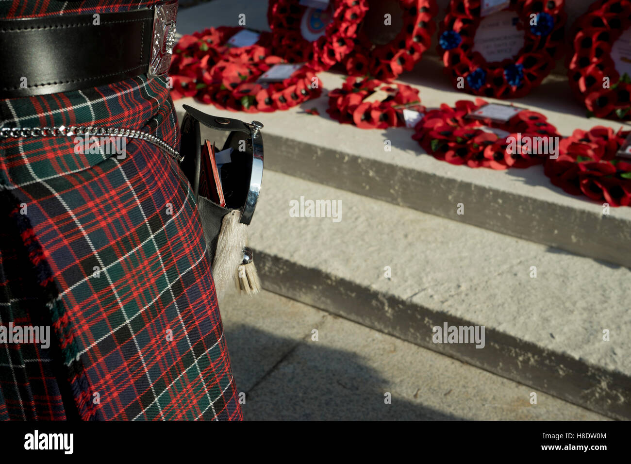 People pay respect to their dead relatives and friends with crosses and ...