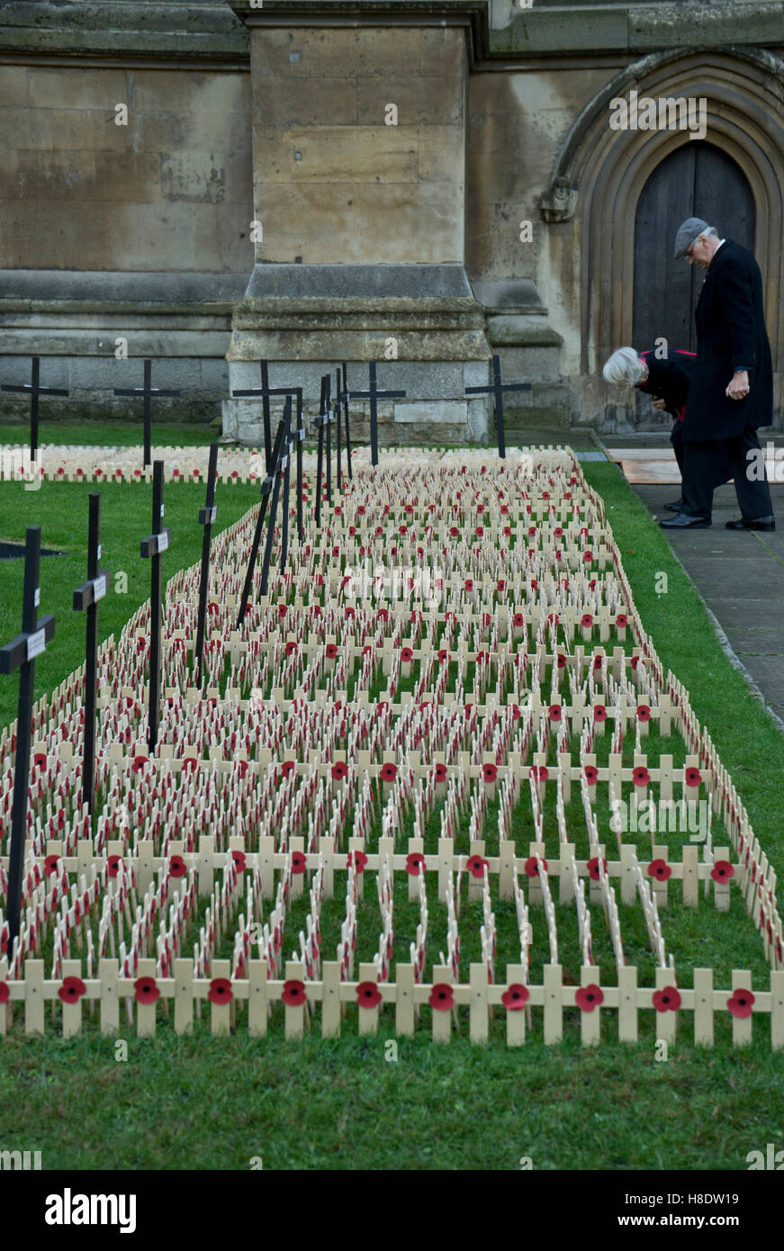 People pay respect to their dead relatives and friends with crosses and ...