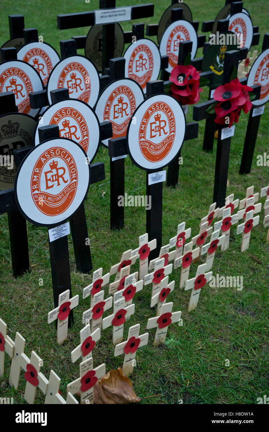 People pay respect to their dead relatives and friends with crosses and ...