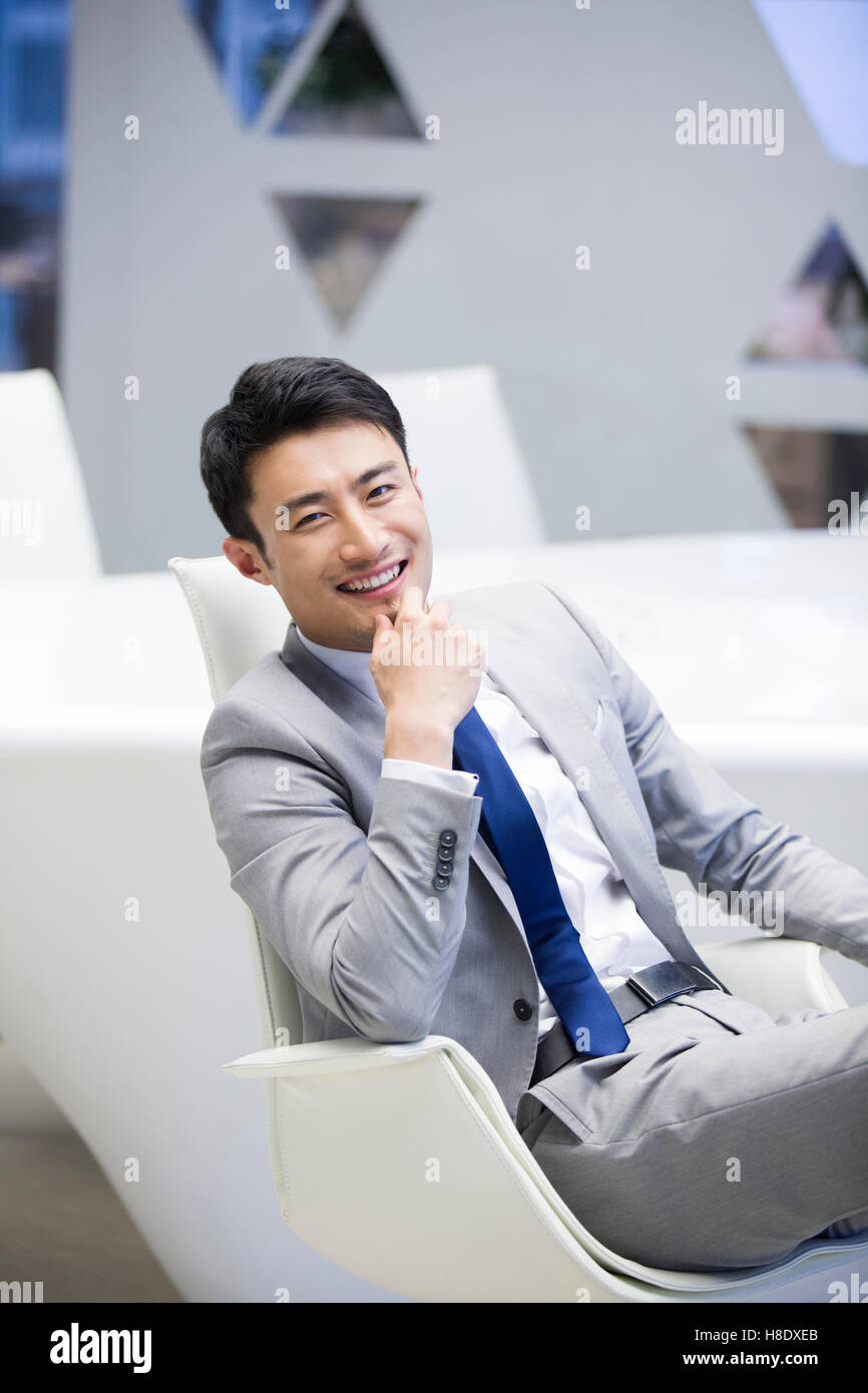 Portrait of confident Chinese businessman Stock Photo - Alamy