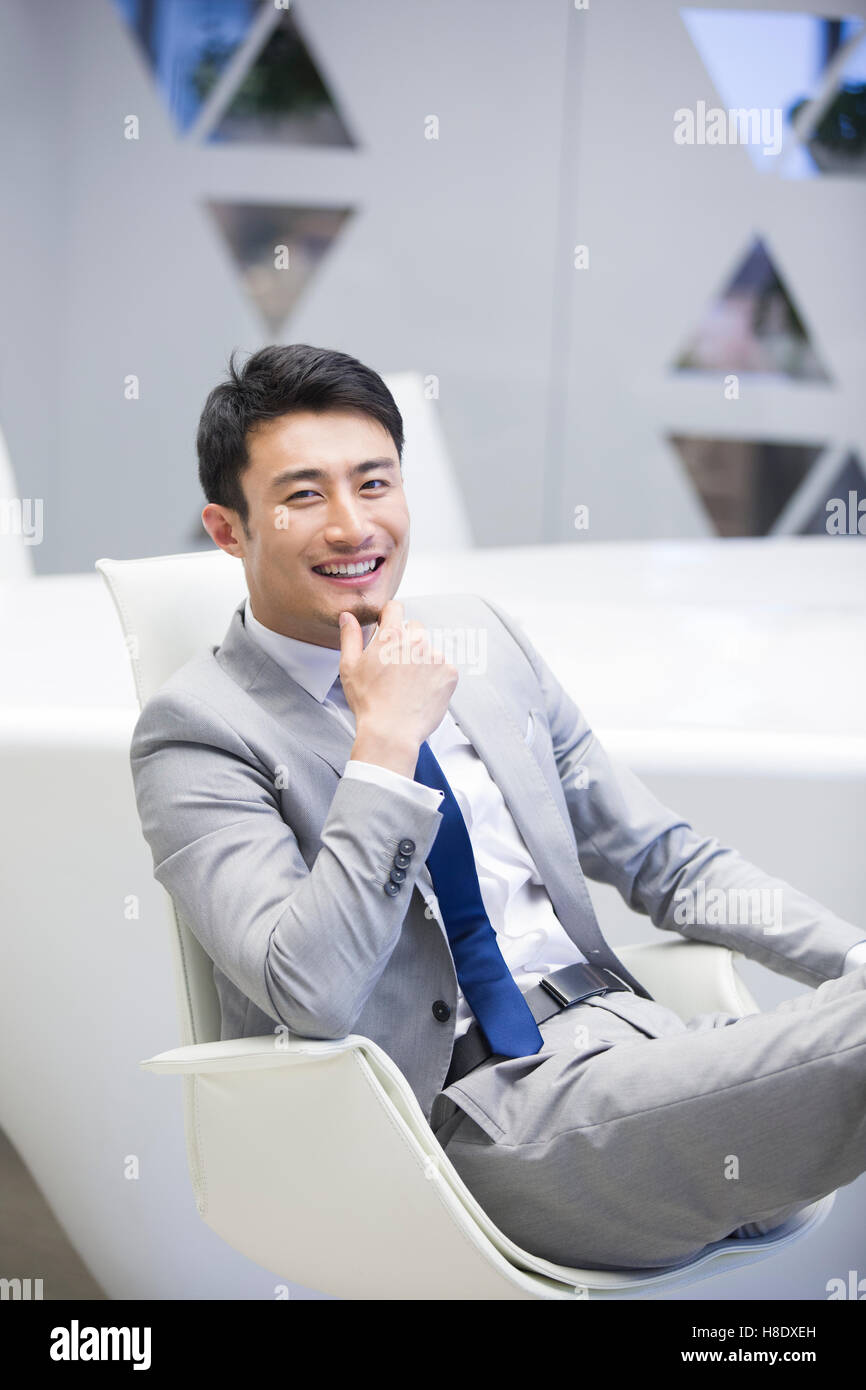 Portrait of confident Chinese businessman Stock Photo - Alamy