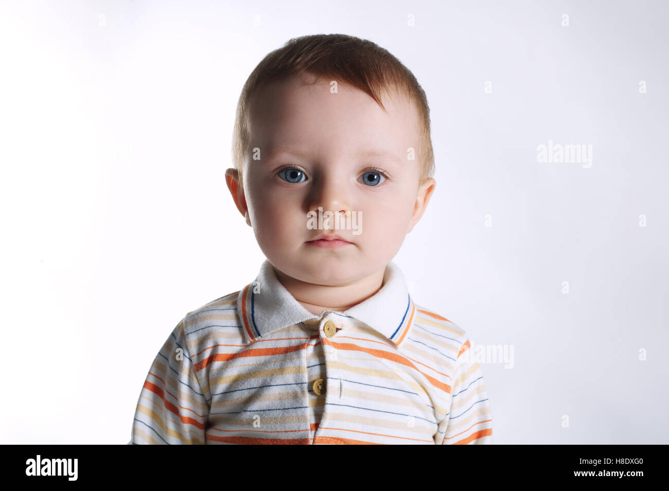 little beautiful boy on bright background Stock Photo - Alamy